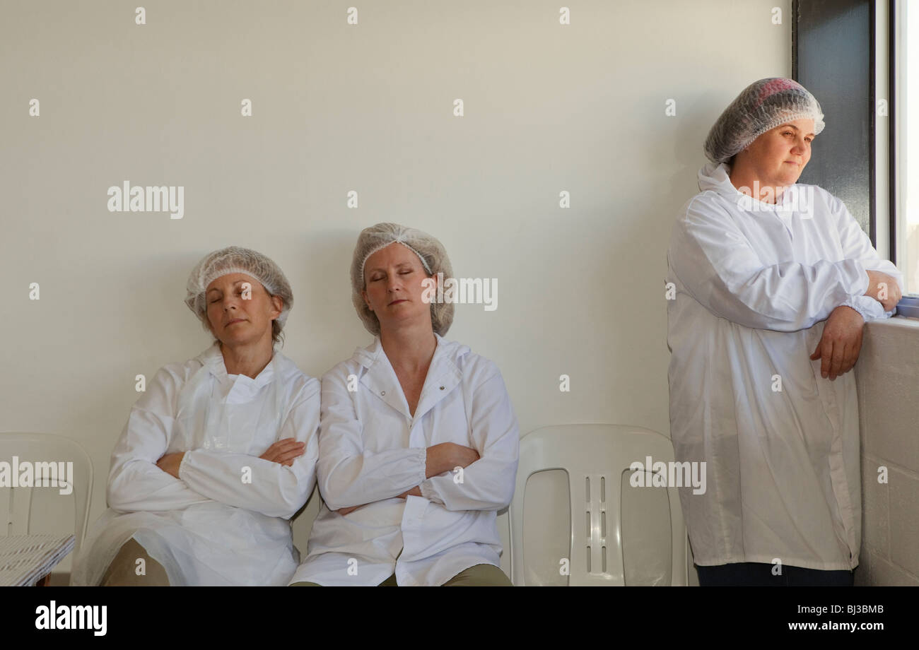Factory workers resting Stock Photo - Alamy