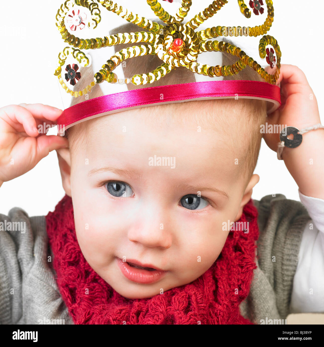 Baby girl with a crown on her head Stock Photo - Alamy