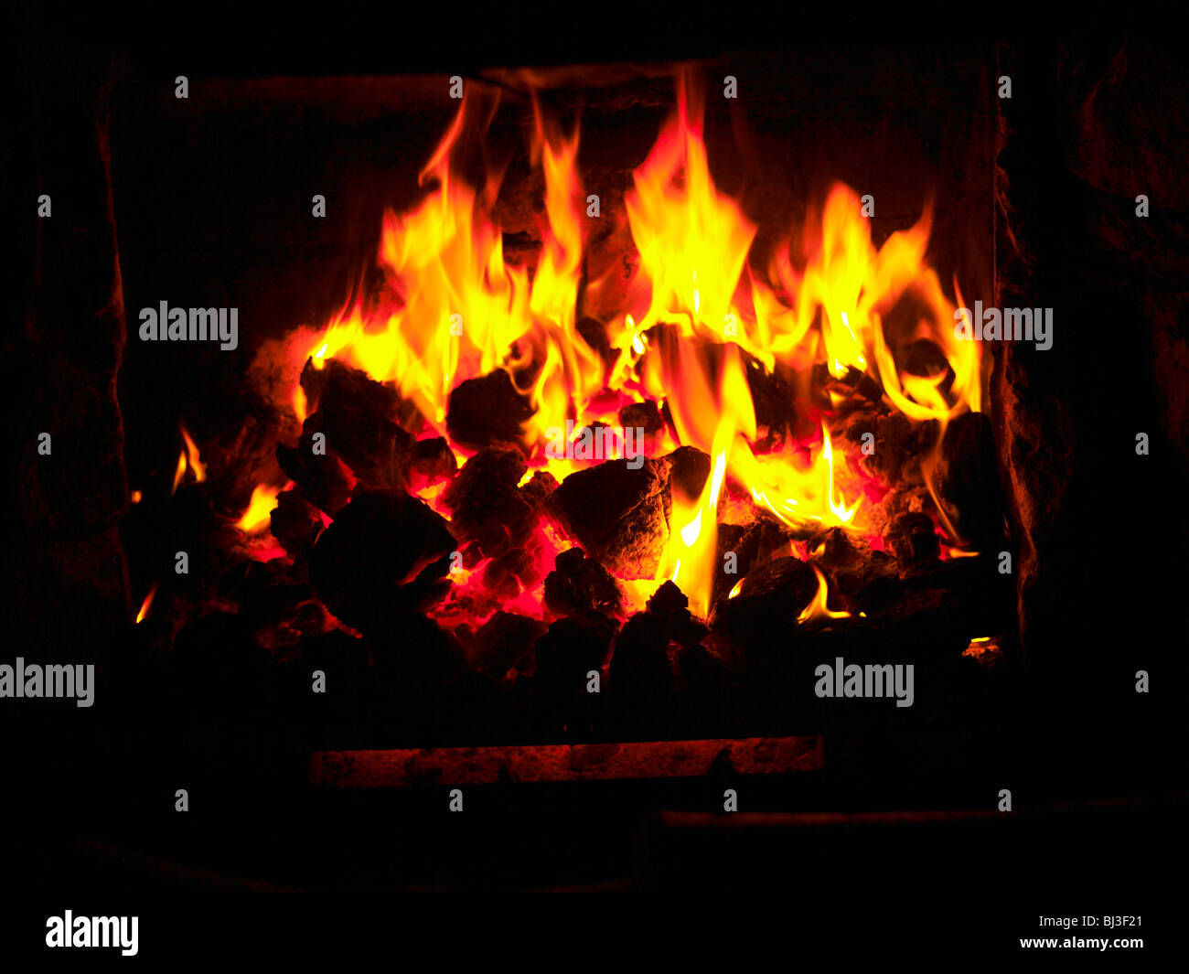Flames of coal fire or barbeque barbecue Stock Photo - Alamy