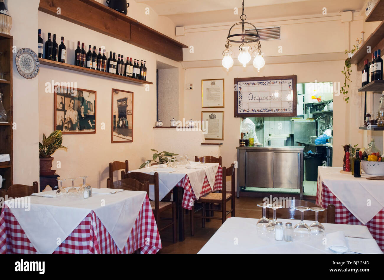 Set tables in the Trattoria Acquacotta, Florence, Tuscany, Italy ...