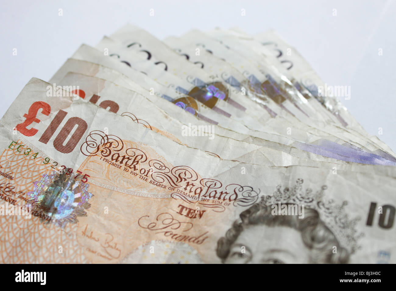 Ten and Twenty pound notes fanned out Stock Photo - Alamy