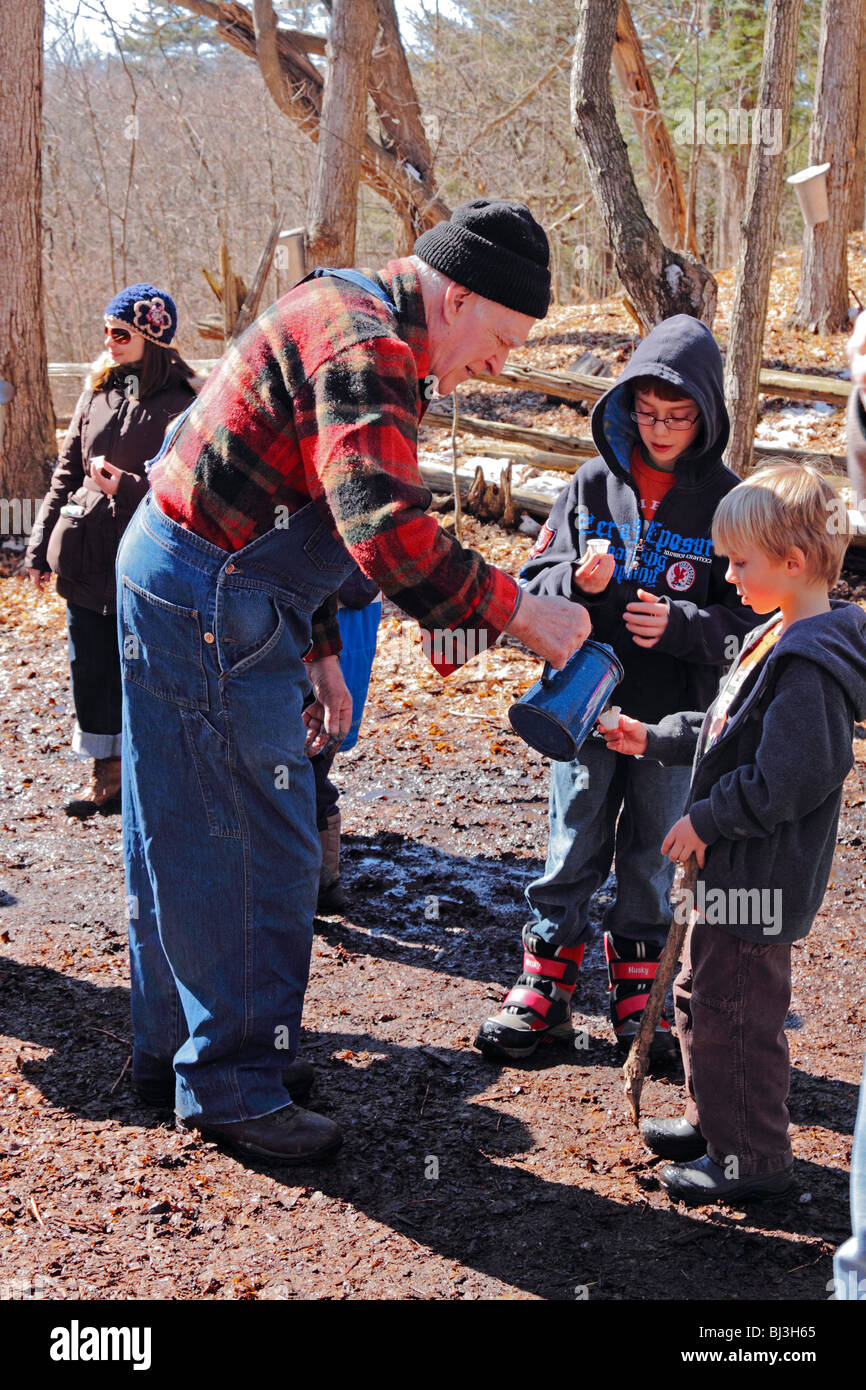 Child tasting maple syrup hi-res stock photography and images - Alamy