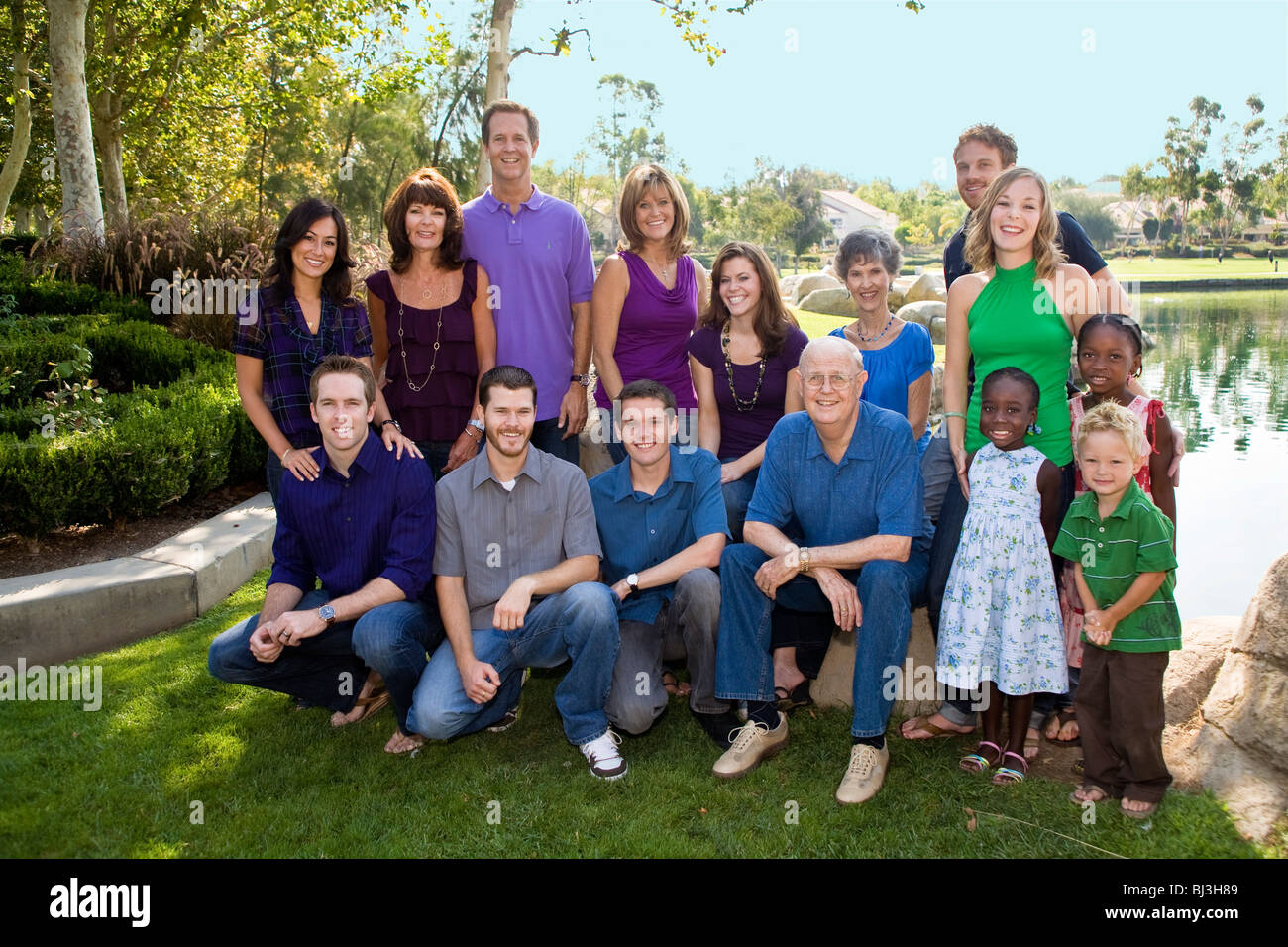 Four Interracial generation family portrait two sisters 4-8 year years ...