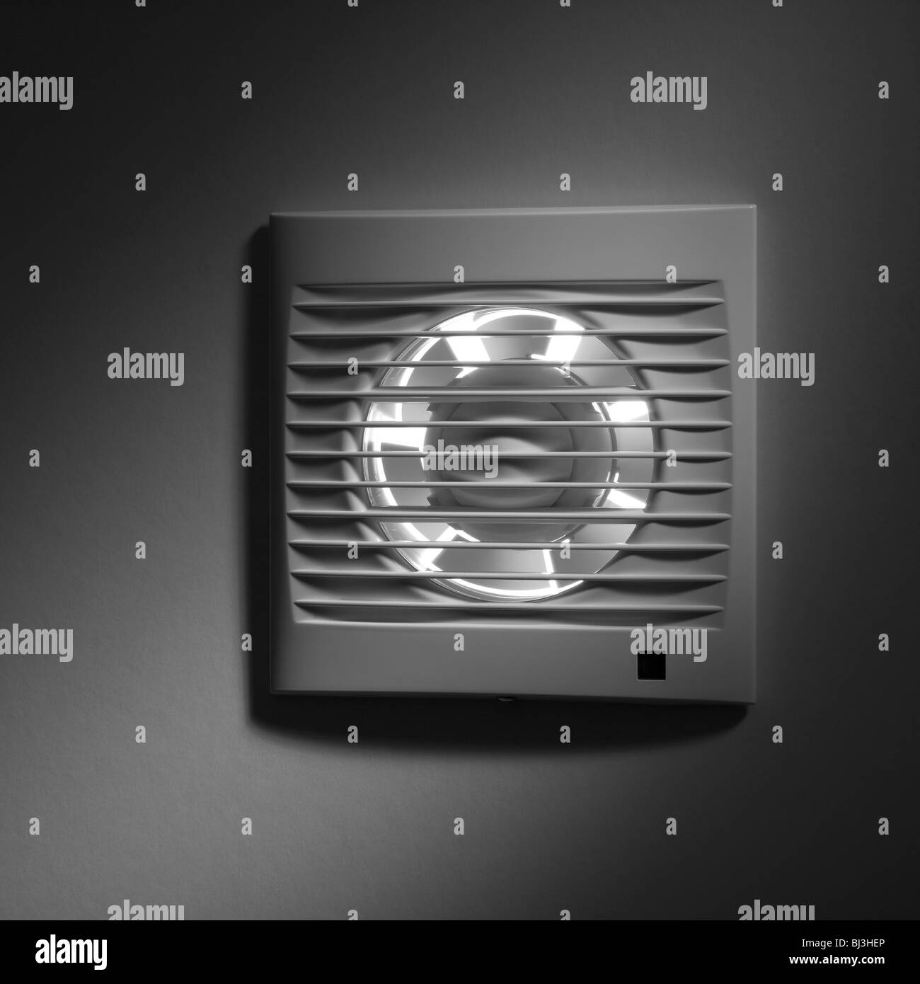 Extractor fan set into wall Stock Photo - Alamy