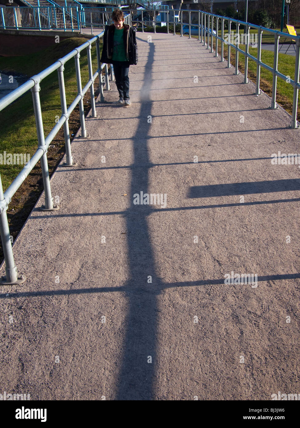 Boy Walking Along a Path, Dundee Stock Photo - Alamy