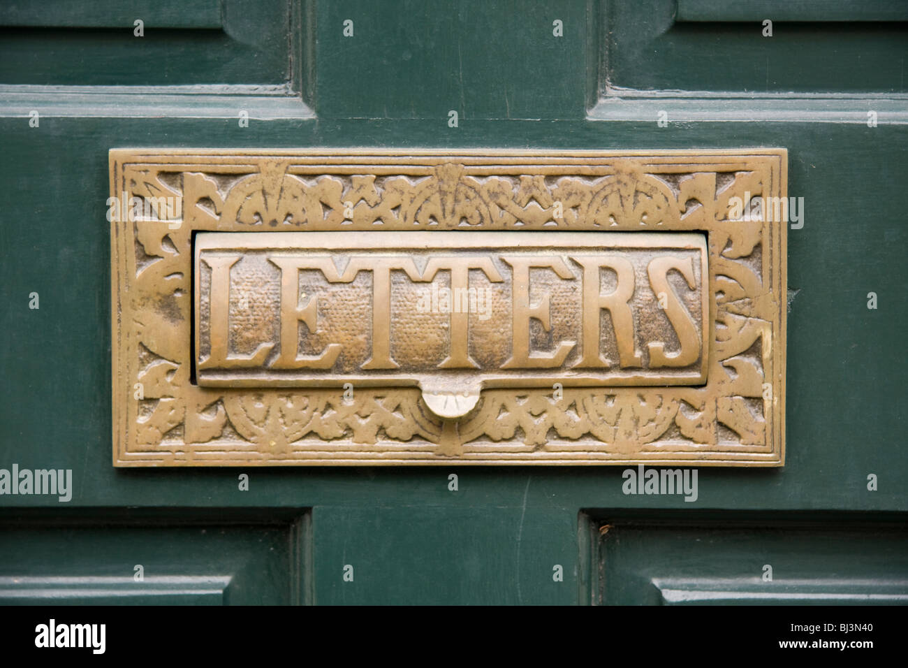 Letterbox on a front door Stock Photo - Alamy