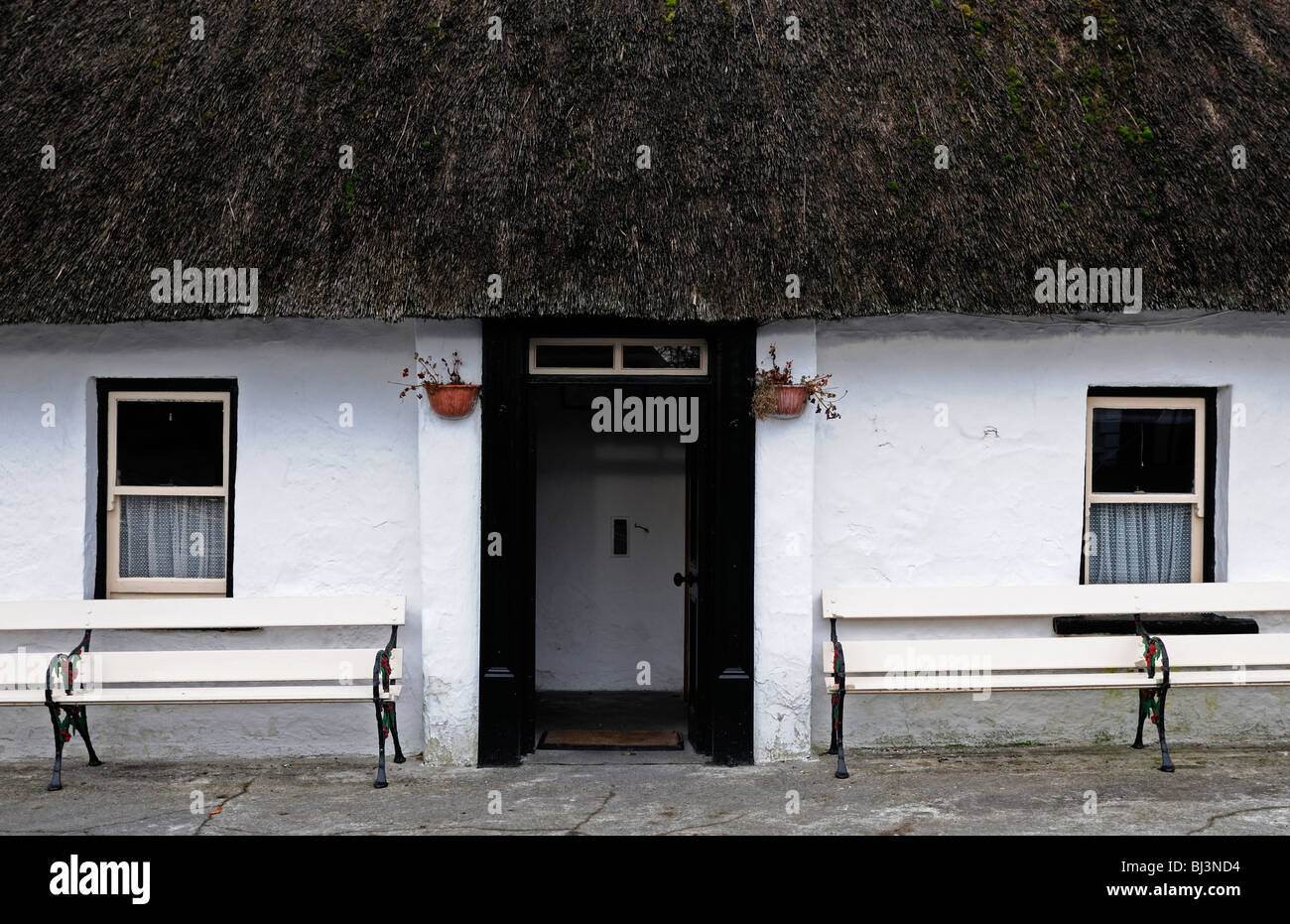 Exterior of Pa mahers maher's thatched pub with the door open boher ...