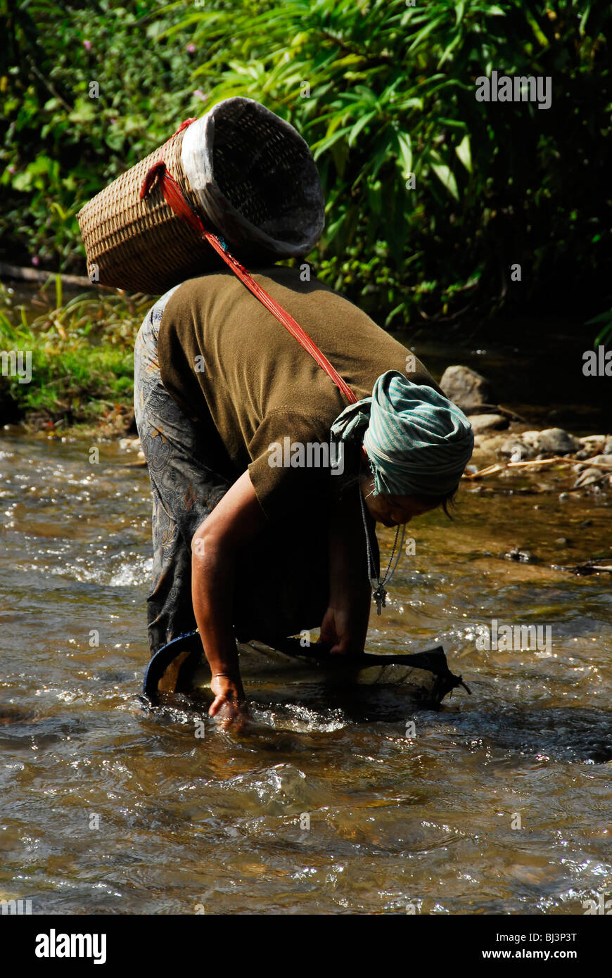 karen lady fishing , mae la refugee camp(thai burmese border) , north ...