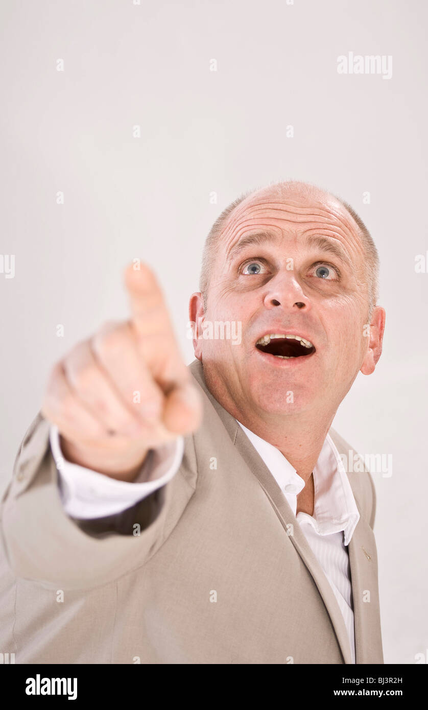 Businessman shows index finger hi-res stock photography and images - Alamy