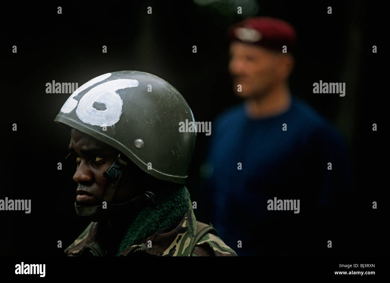 A worried-looking black soldier recruit gazes into the distance in ...