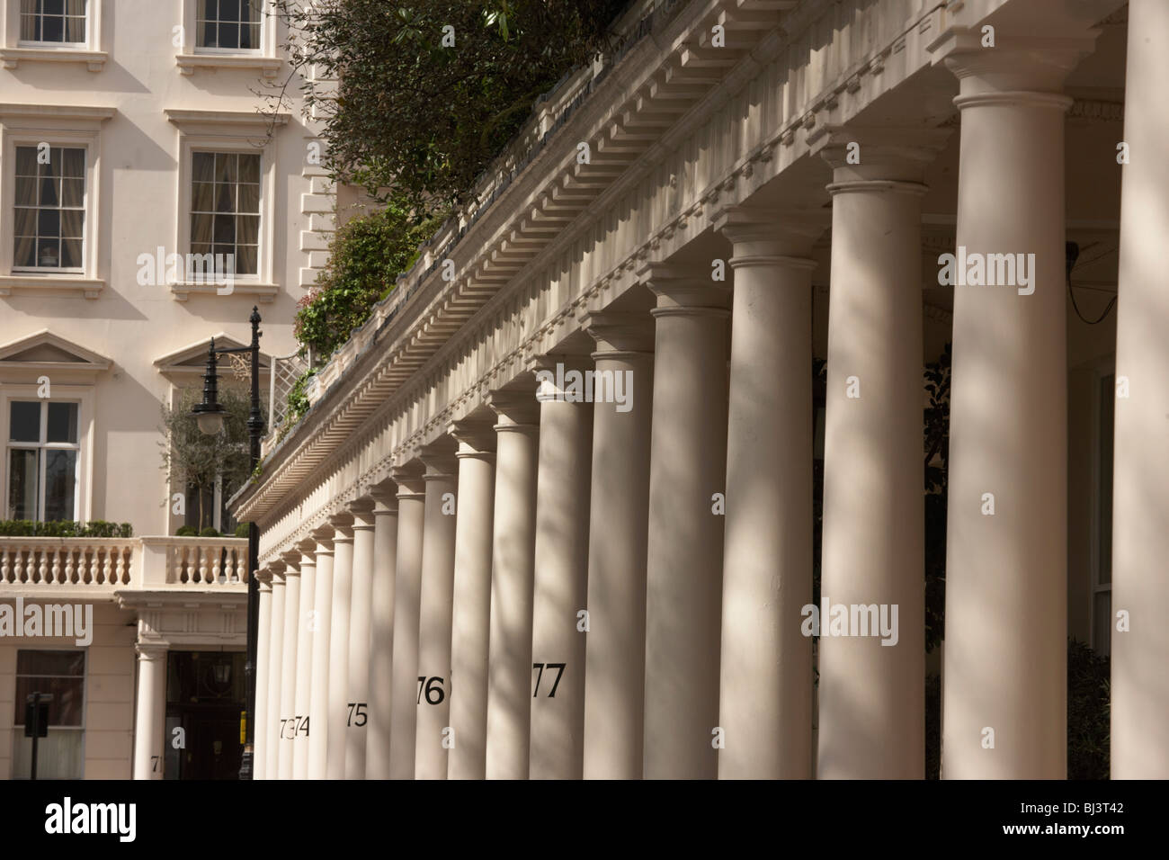 Corinthian columns and covered doorways of exclusive and classically ...
