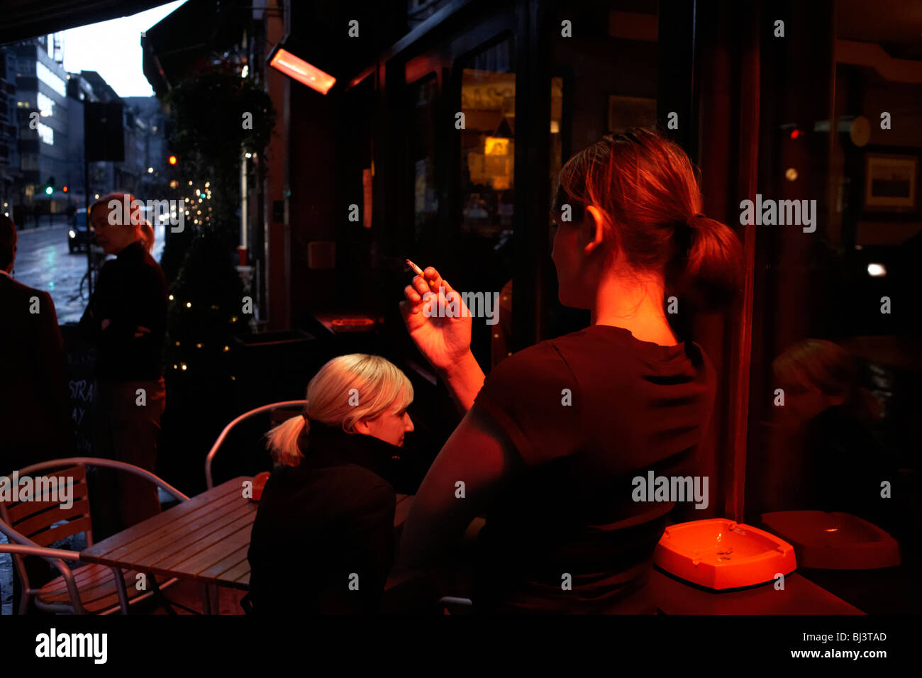 Woman smoking outside office hi-res stock photography and images - Alamy