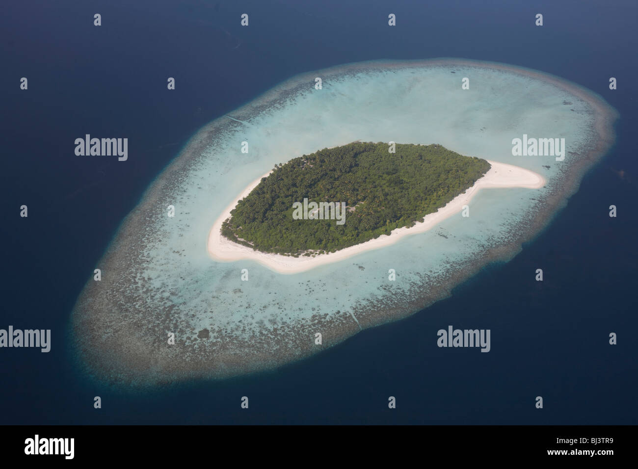 An aerial view of a completely uninhabited, deserted island seen from a ...