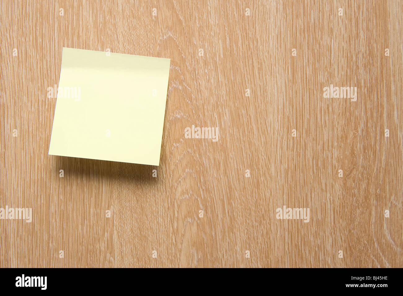 Blank Yellow Post-it Note Wooden Door Table Surface - landscape ...