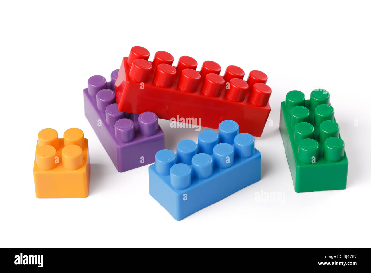 photo shot of plastic toy blocks on white background Stock Photo - Alamy