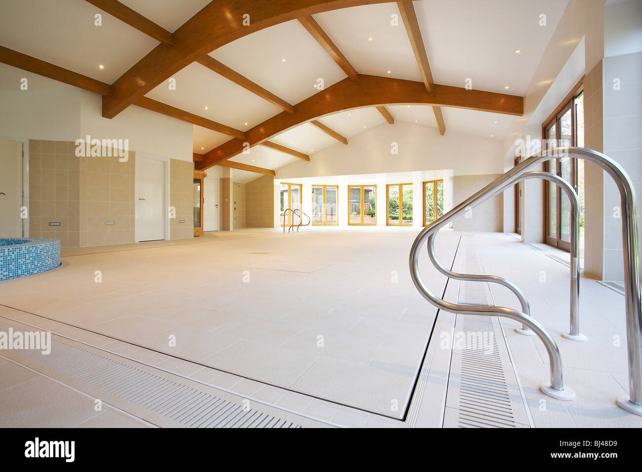 Swimming pool in a house that has a hydraulic tile flooring Stock Photo ...