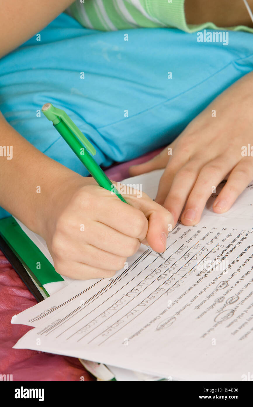 Teenager doing homework Stock Photo - Alamy