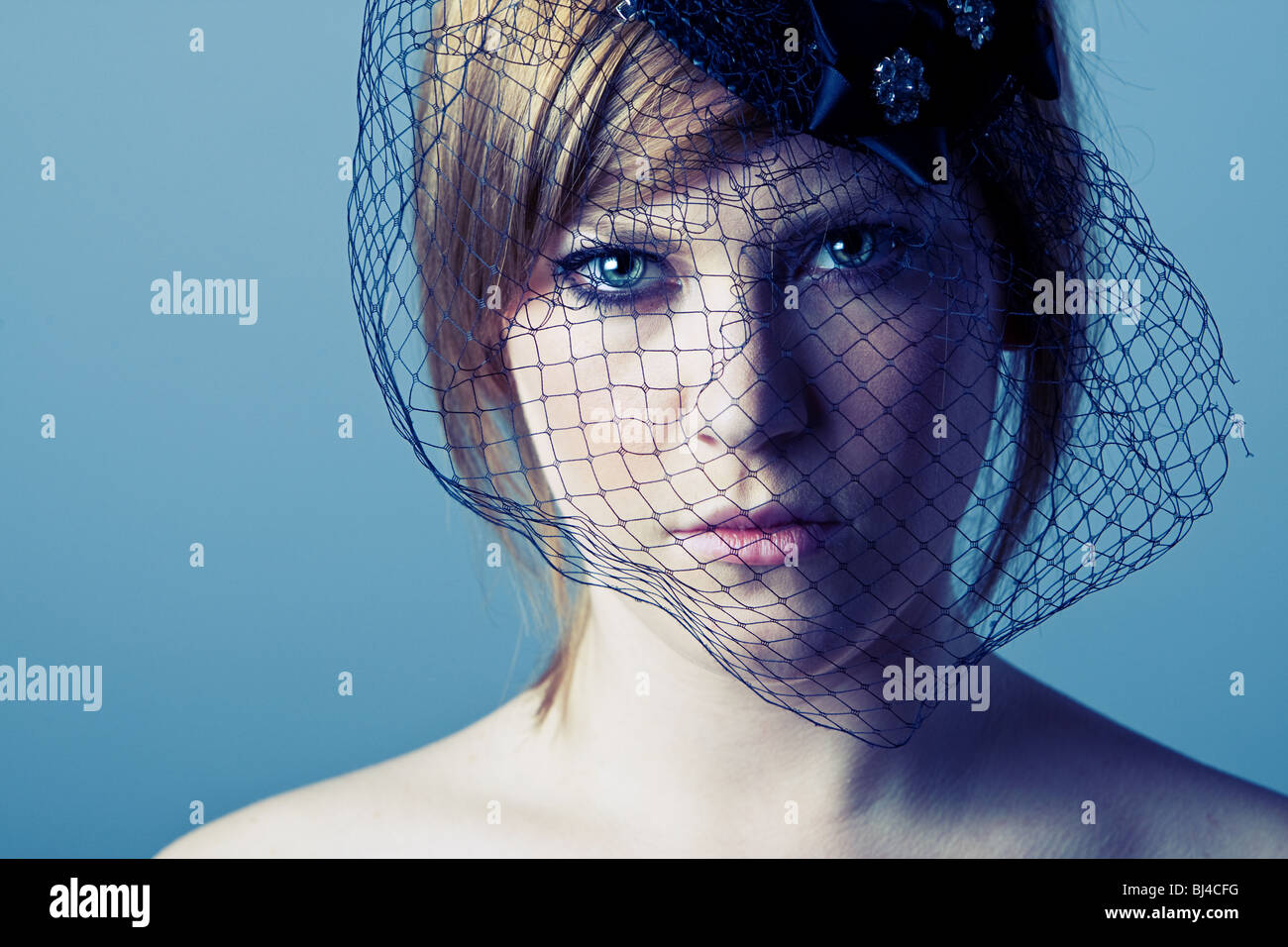 Cross Process Effect Shot of a Beautiful Girl in Veil Stock Photo - Alamy