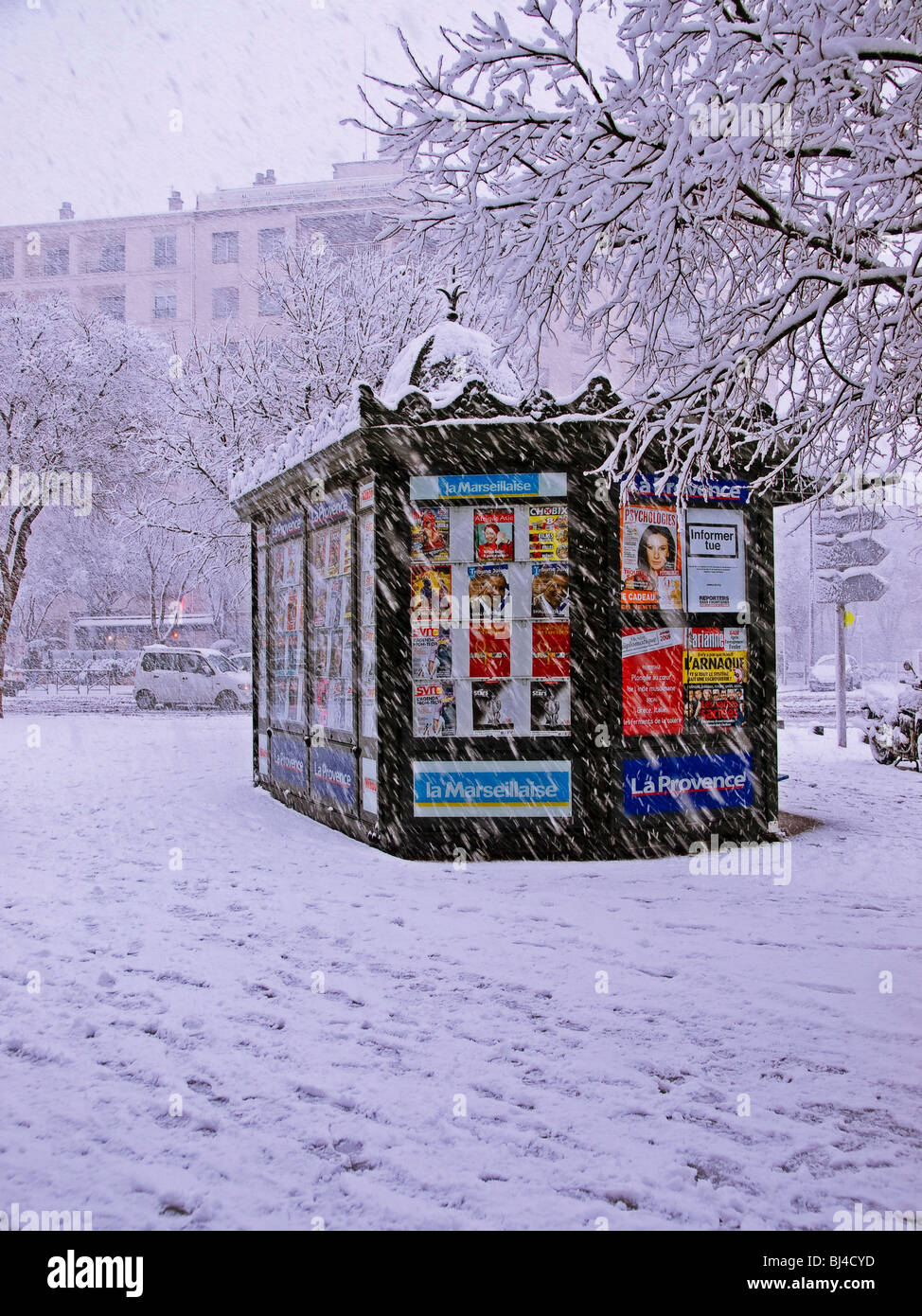 Newspaper and magazines kiosk by snowstorm in Marseilles Stock Photo ...