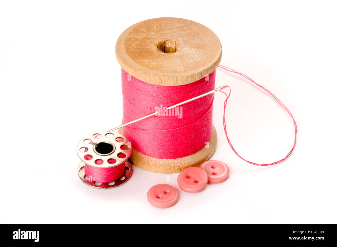 Needle and thread and buttons hi-res stock photography and images - Alamy