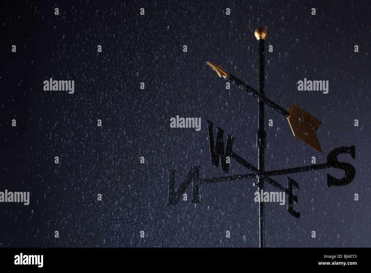 Weather Vane in Rain Stock Photo - Alamy