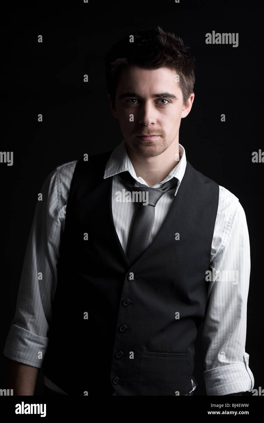 Shot of a Smart Looking Male in Shirt, Tie and Waistcoat Stock Photo ...