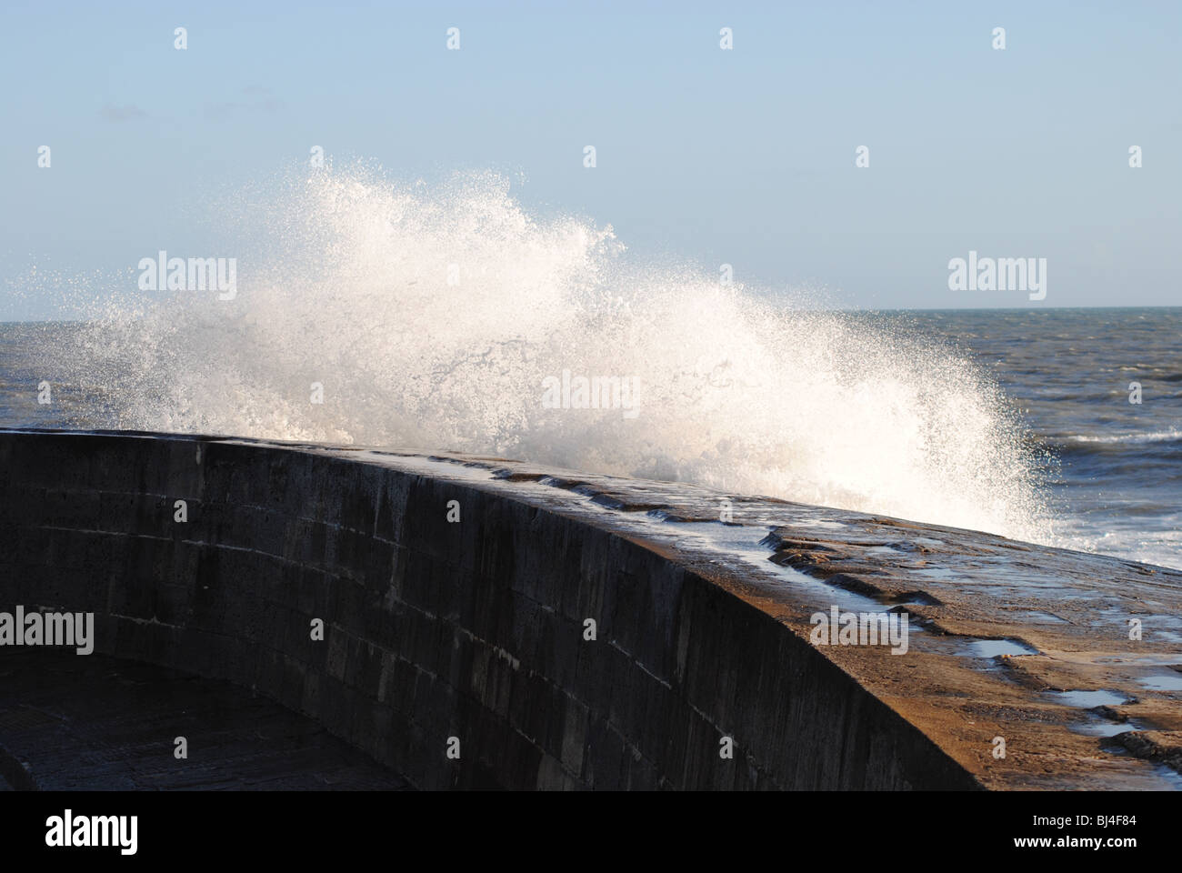 Stone wall sea defence defense hi-res stock photography and images - Alamy