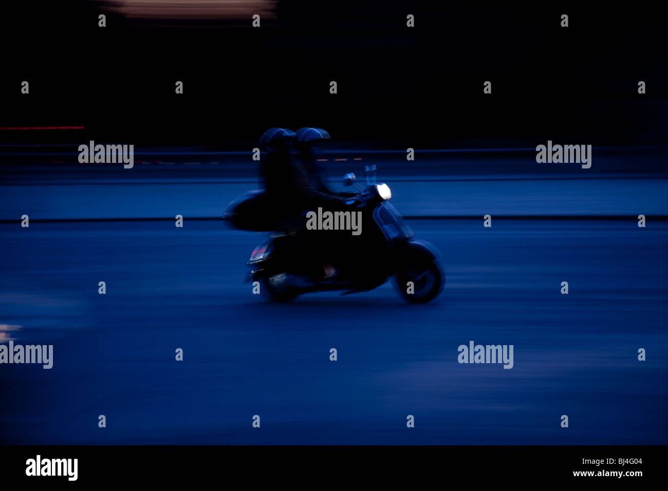 Man scooter night hi-res stock photography and images - Alamy