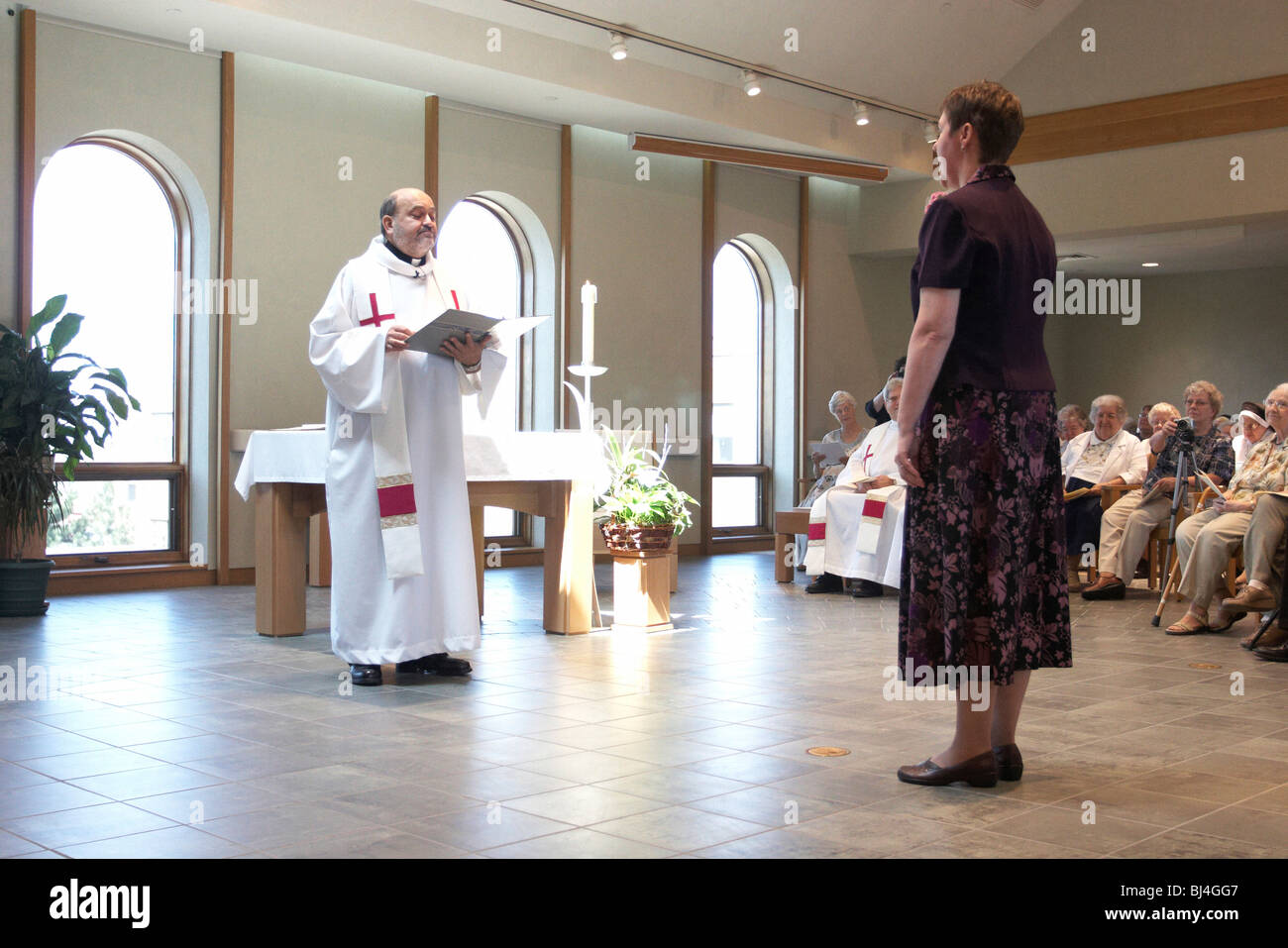 A Catholic Mass celebrating a nun joining a religious order Stock Photo ...