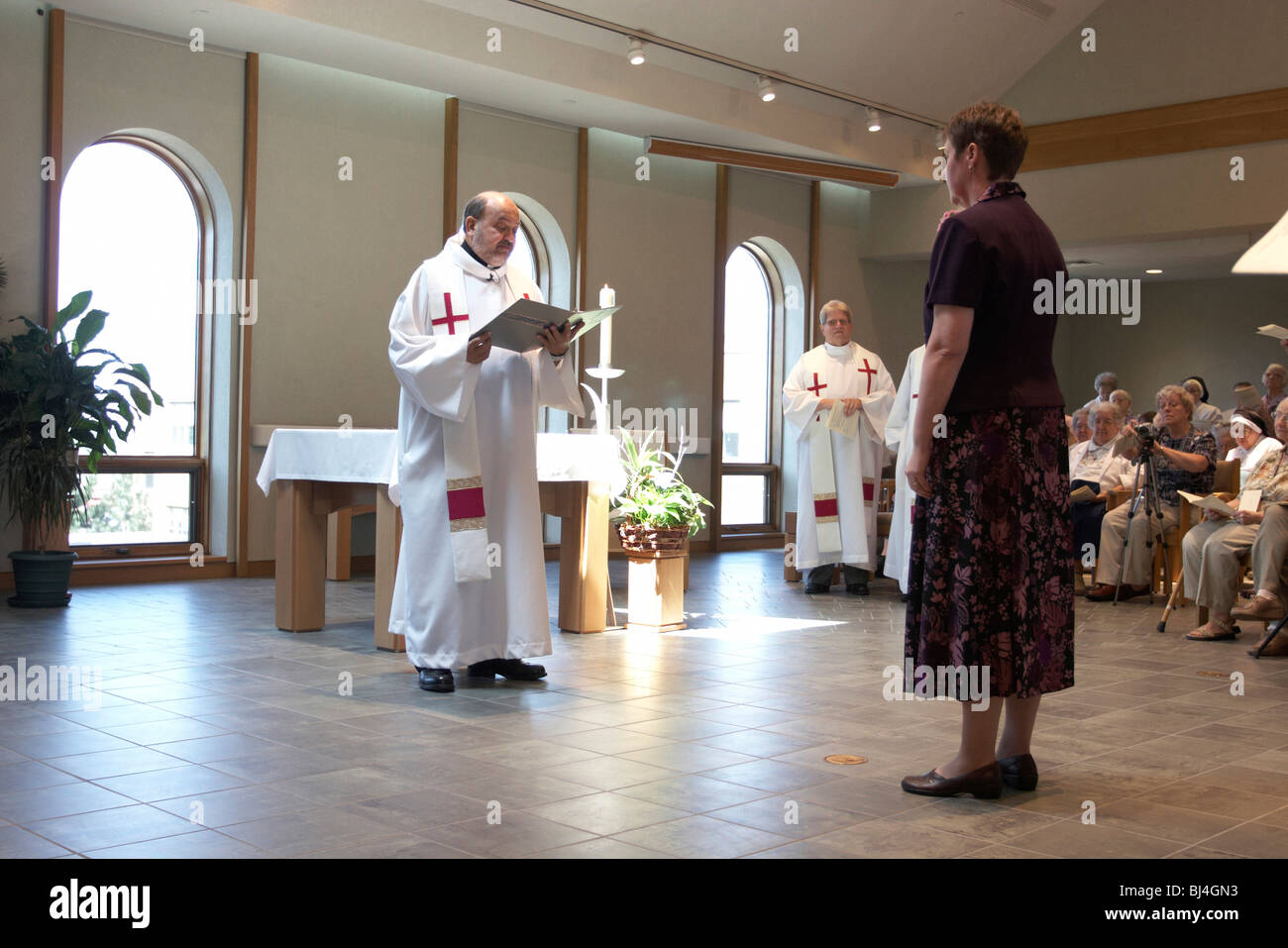A Catholic Mass celebrating a nun joining a religious order Stock Photo ...
