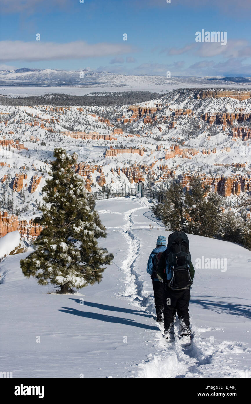 Hikers exploring Bryce Canyon National Park, Utah, in deep snow Stock ...