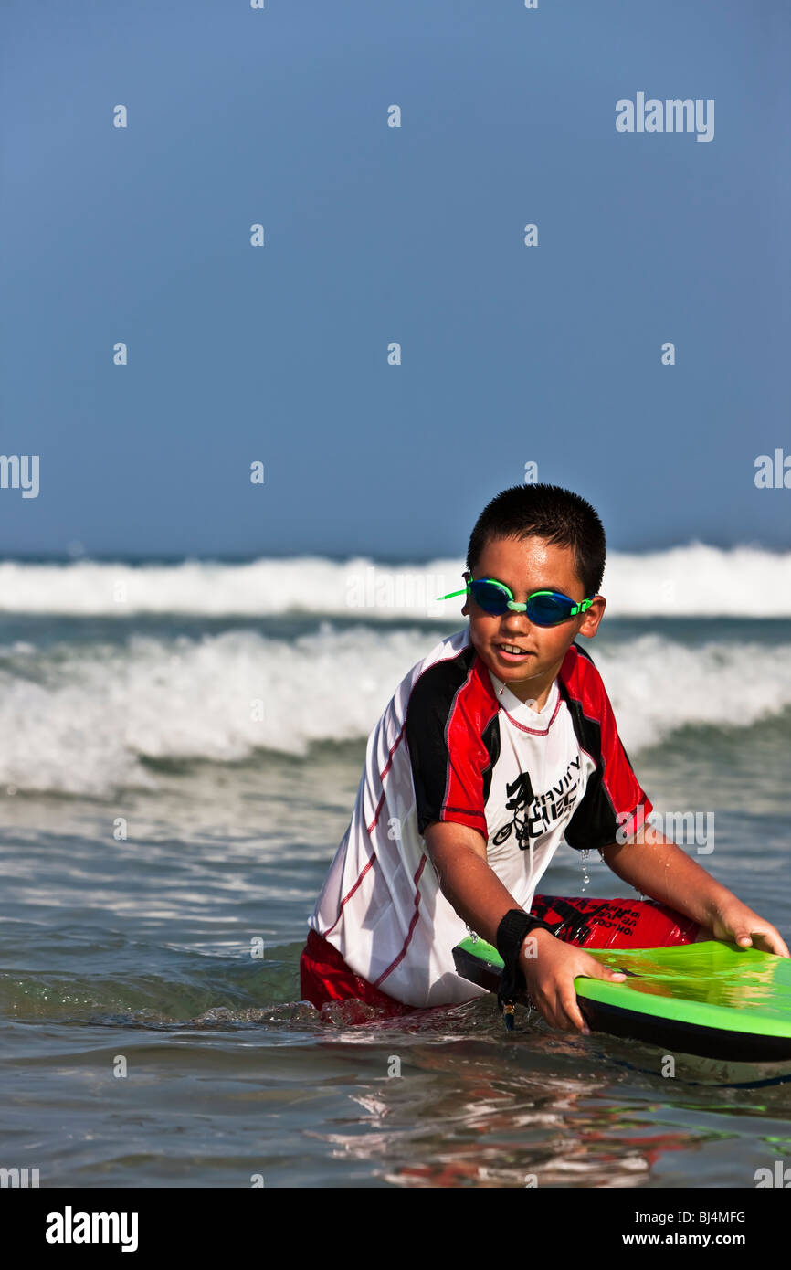 Boogie boarding in Hawaii Stock Photo - Alamy