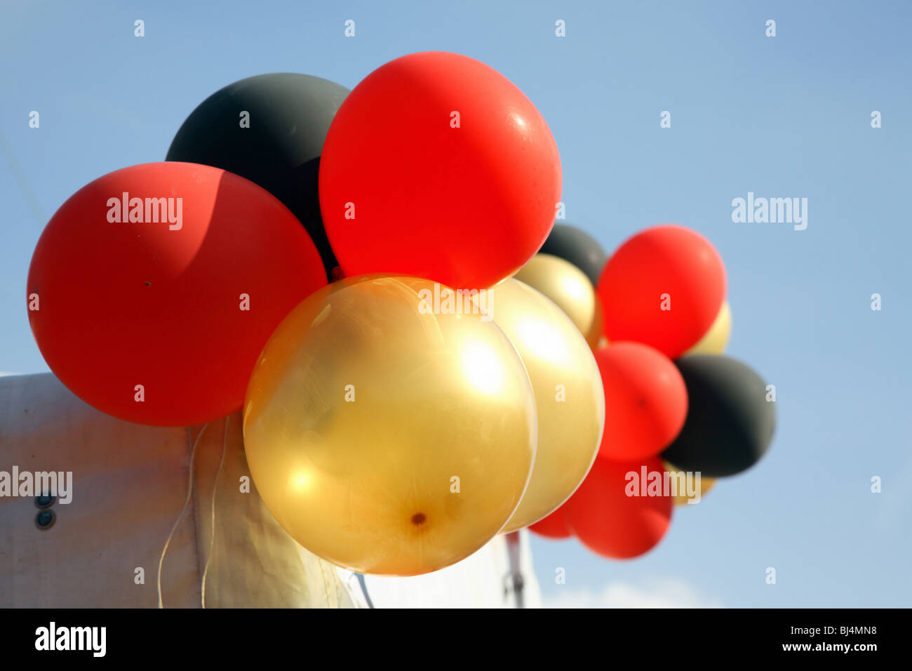 Balloons in German national colours Stock Photo - Alamy