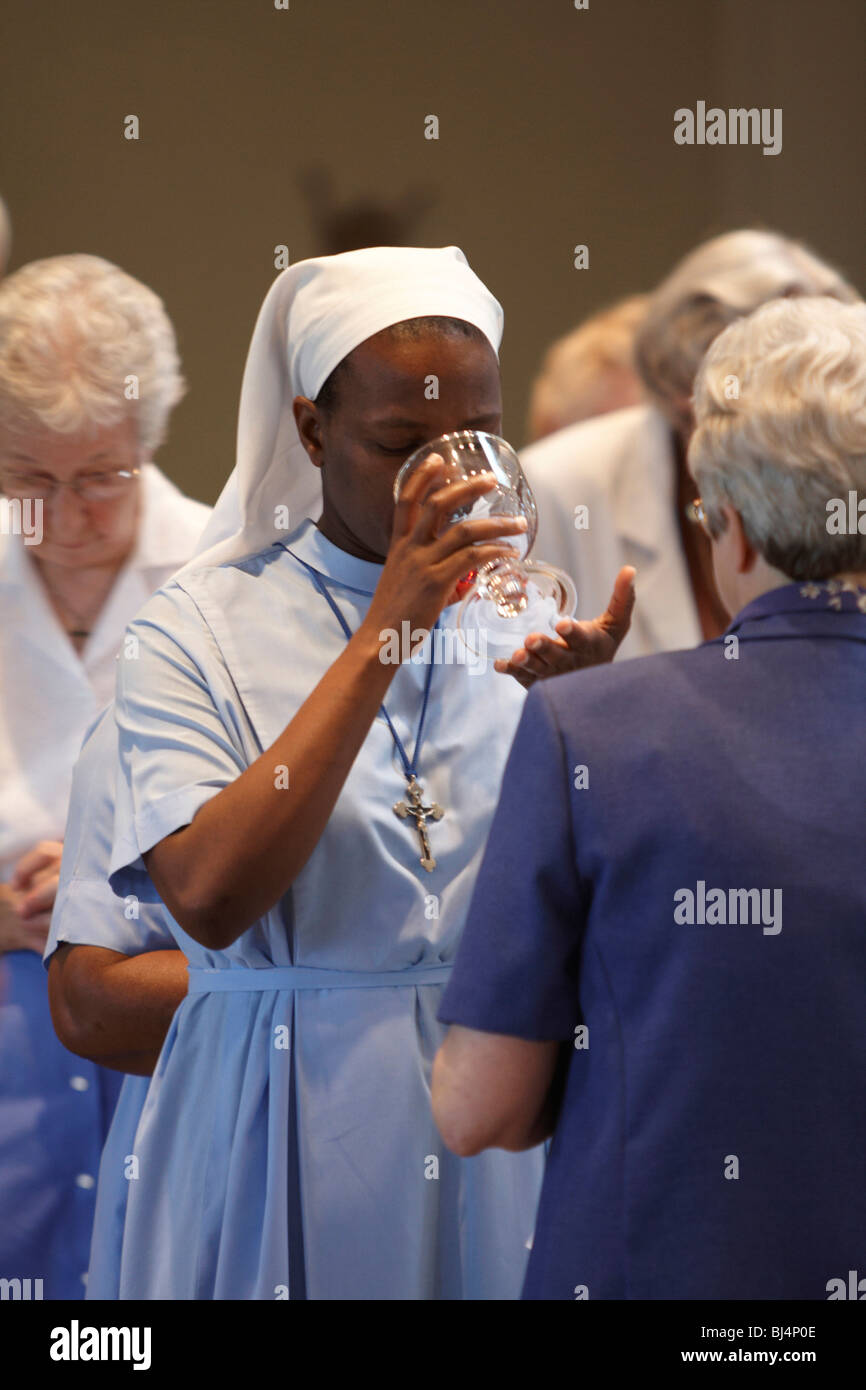 A Catholic Mass celebrating a nun joining a religious order Stock Photo ...