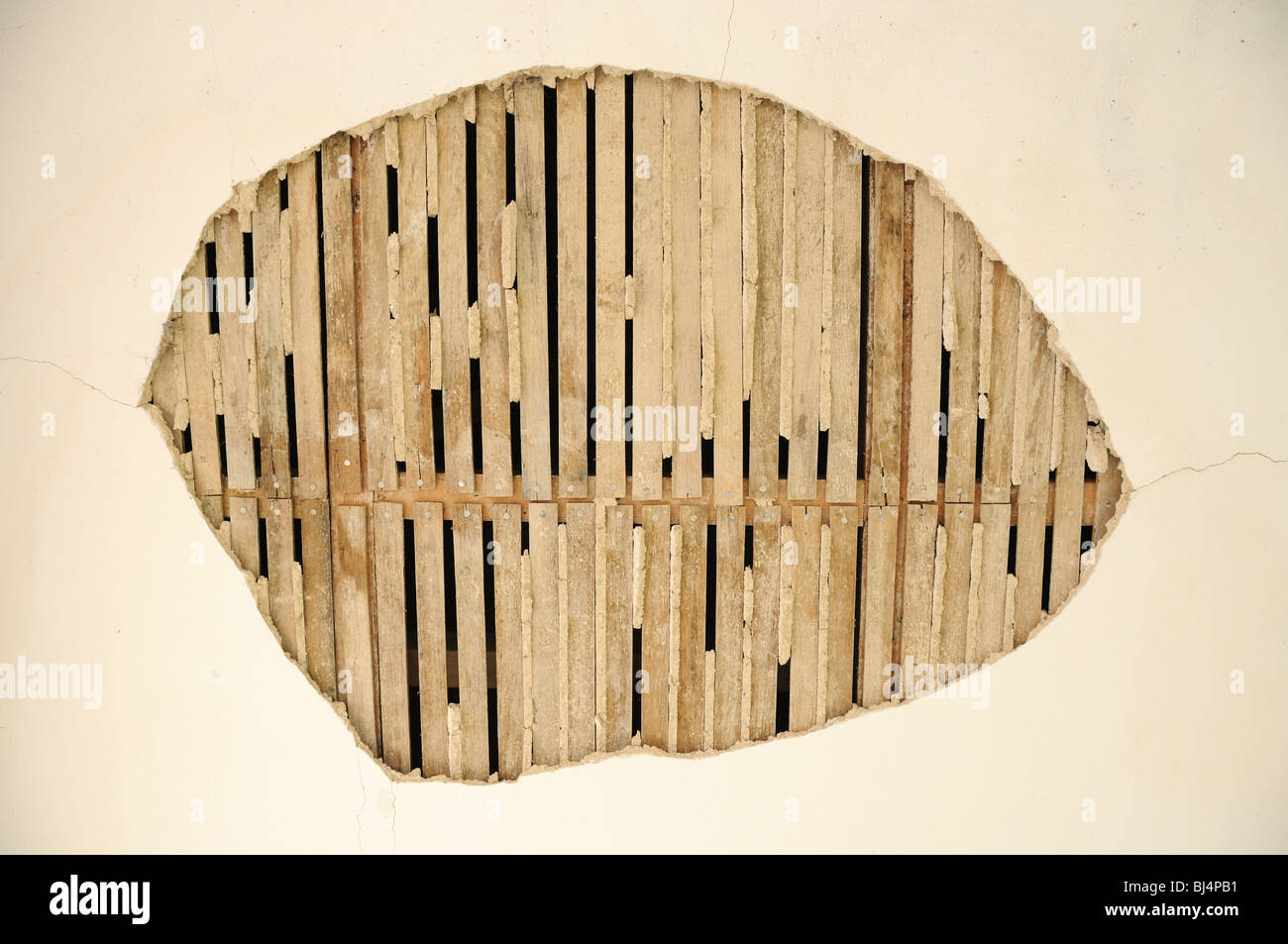 Exposed plaster and lathe Stock Photo - Alamy