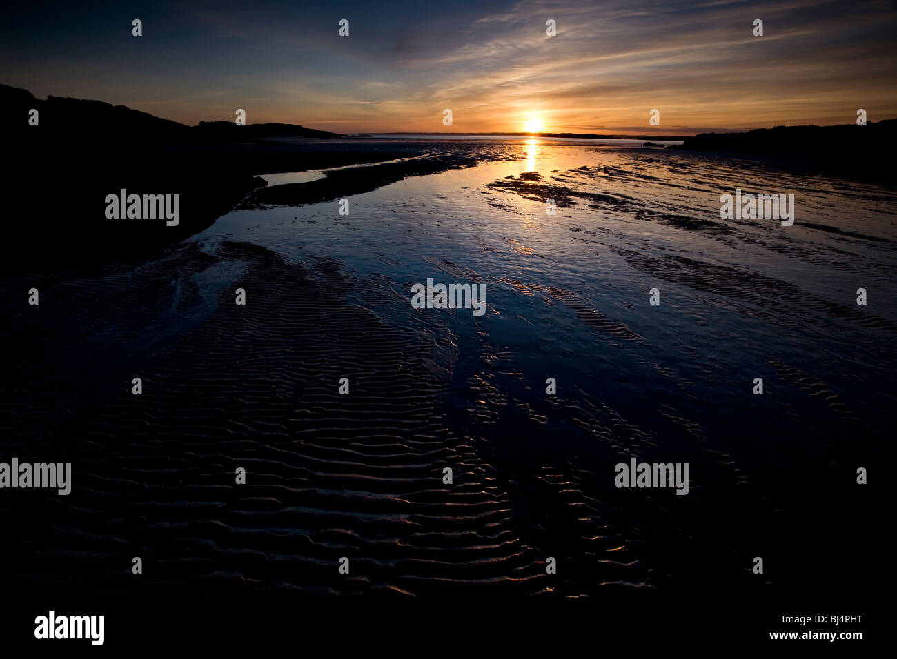 Sunset over Carrick Shore, Dumfries and Galloway, Scotland Stock Photo ...