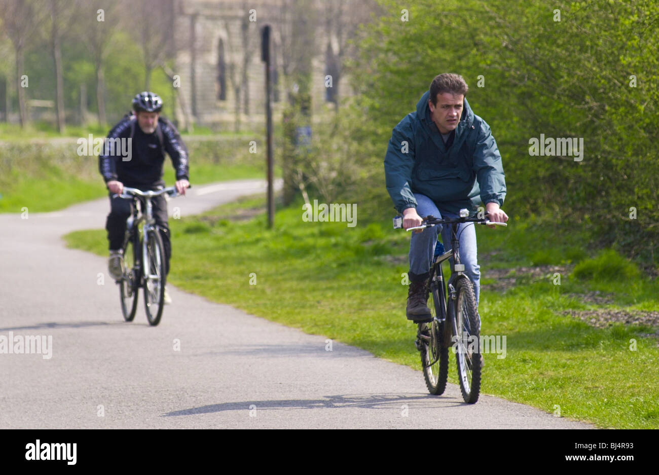 Cyclists on the Sustrans cycle path way at the former Mangotsfield ...