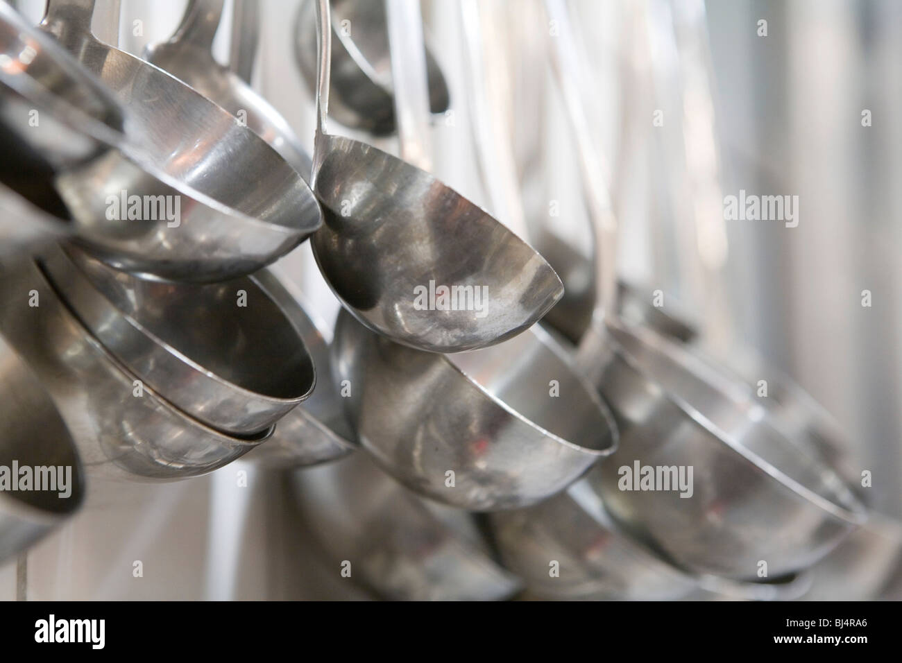Ladles in a commercial kitchen Stock Photo - Alamy