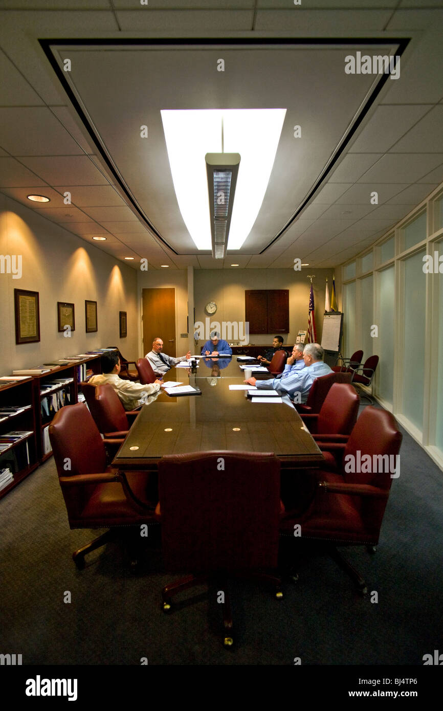 The Santa Ana, California, Chief of Police (blue shirt) conducts a ...