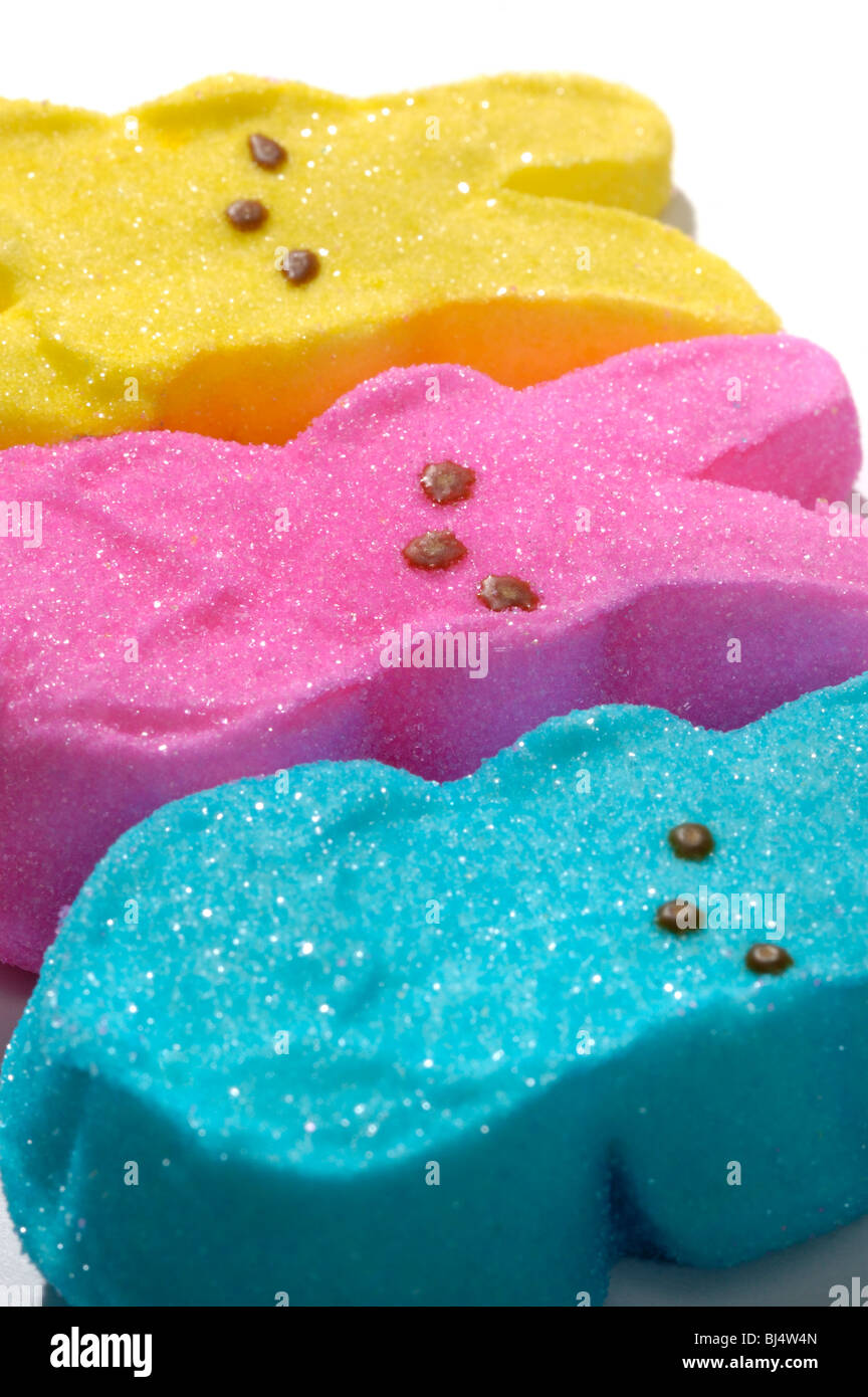 Three colorful bunny shaped sweet candies macro Stock Photo - Alamy