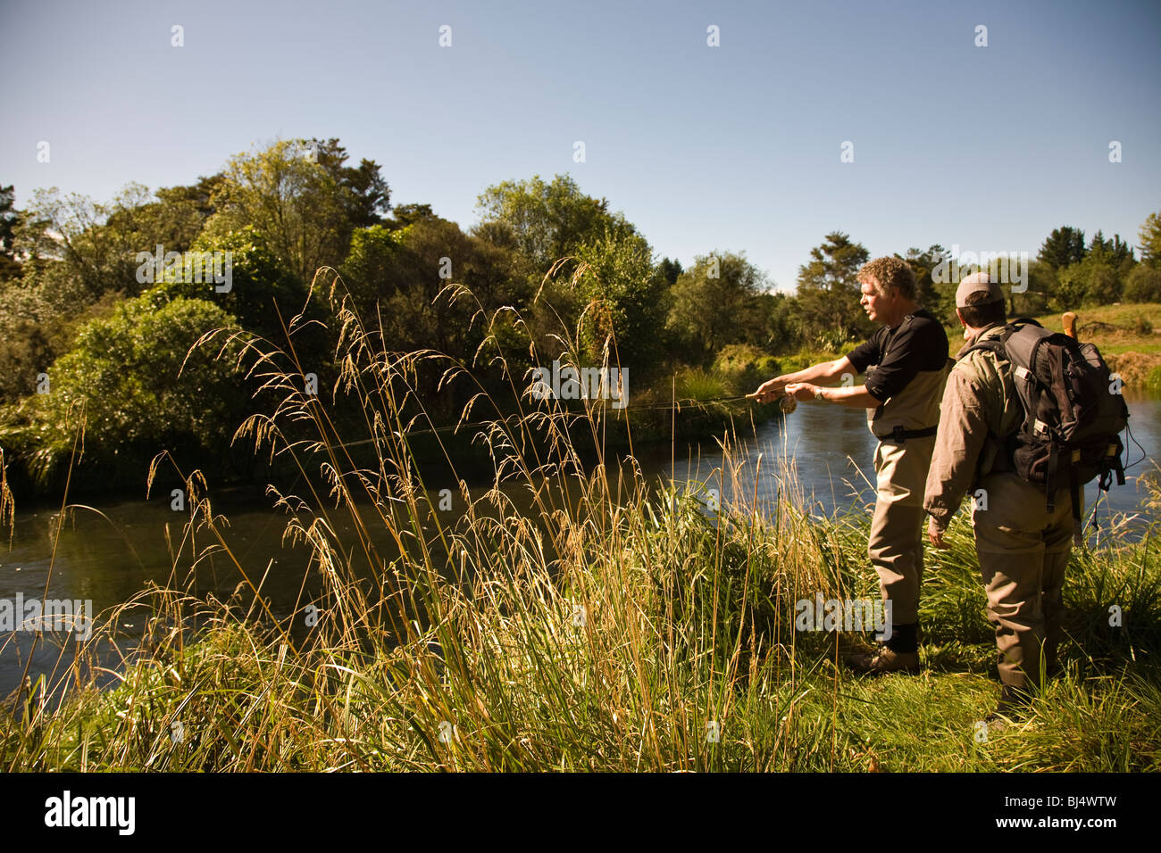 Fishing guide Duncan McDonald guides Huka Lodge guest Dave Houser on a ...