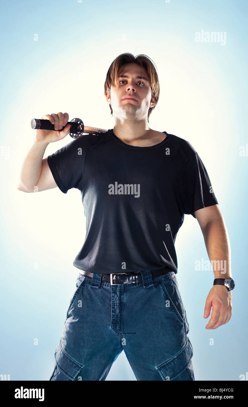 Man holding sword hi-res stock photography and images - Alamy