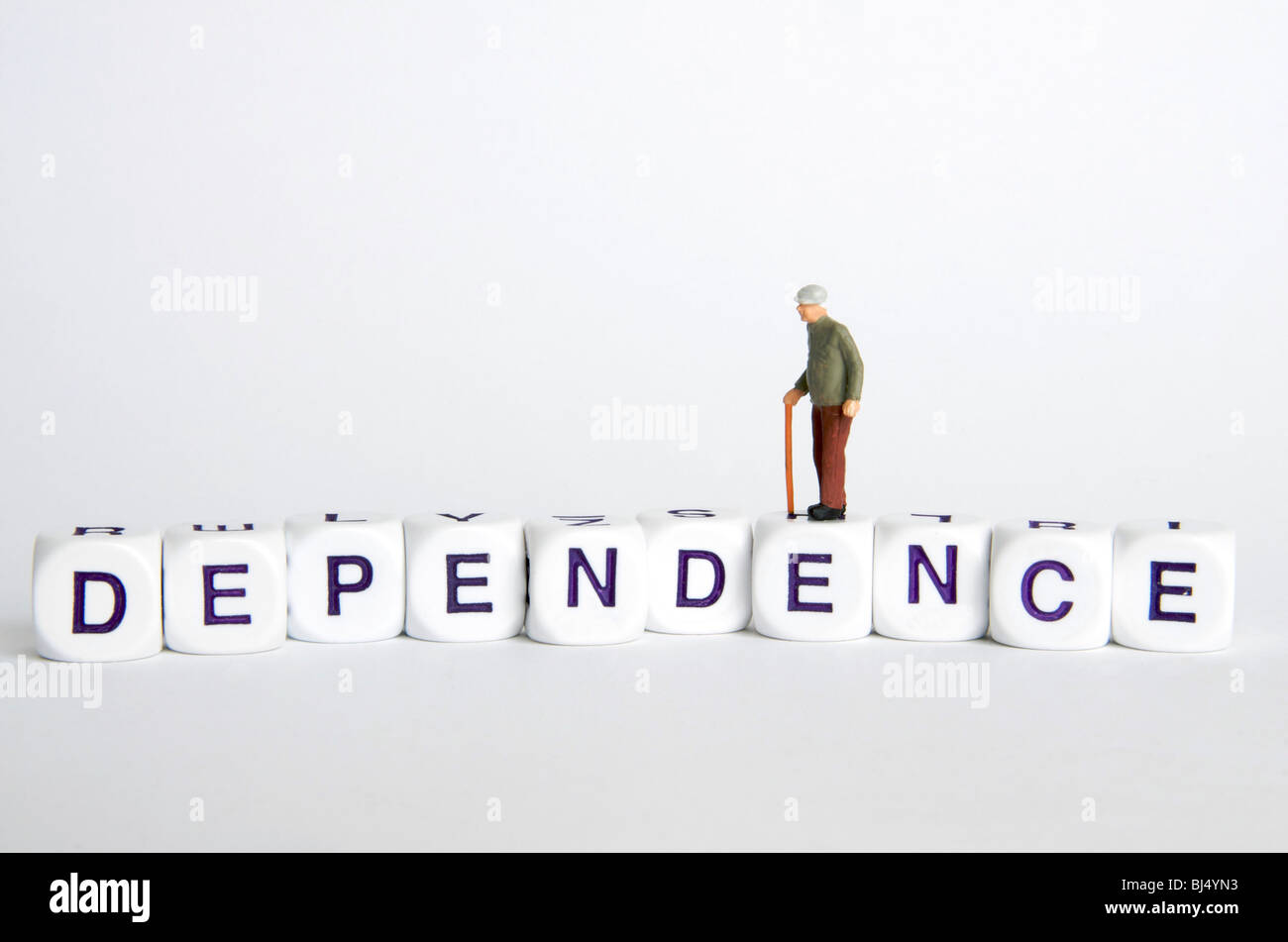 Elderly dependence / independence concept - old man figure standing on ...