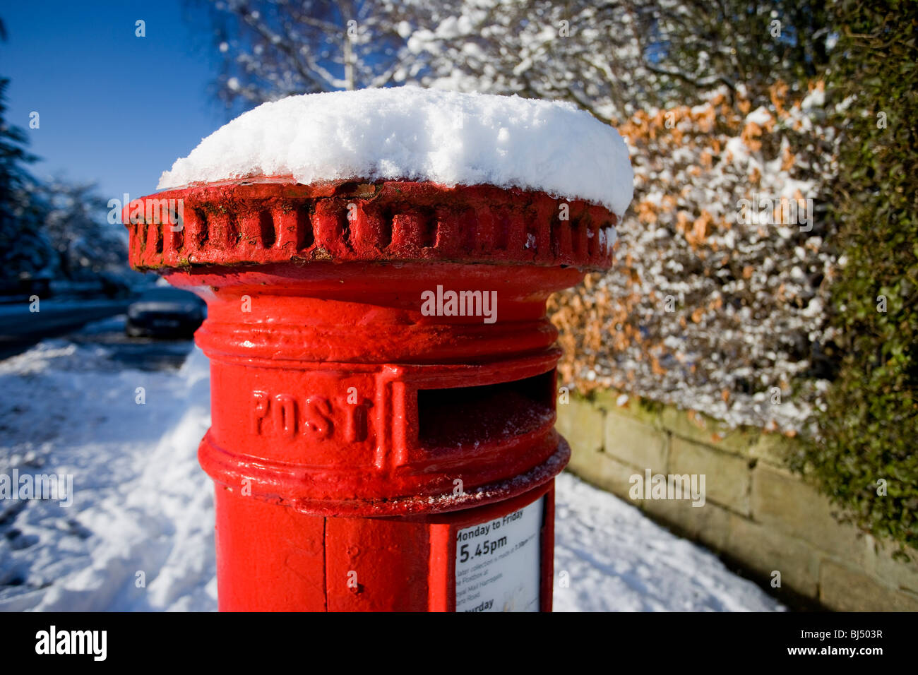 Red letterbox, The Big Snow, Harrogate, North Yorkshire Stock Photo - Alamy