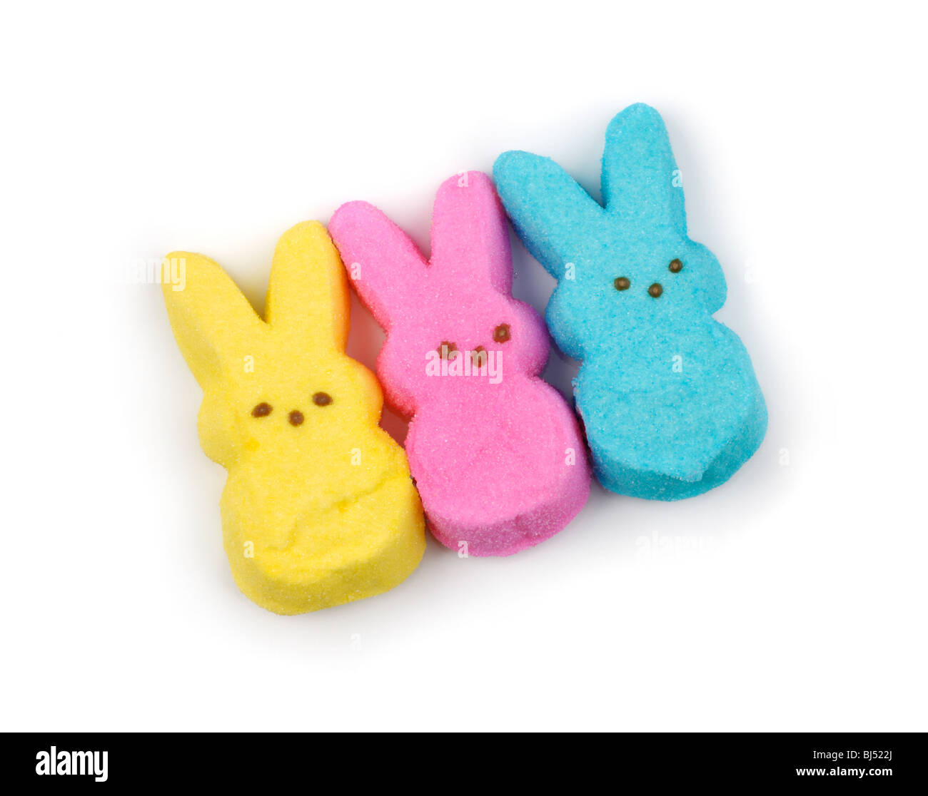 Three colorful bunny shaped candies isolated on white background Stock ...