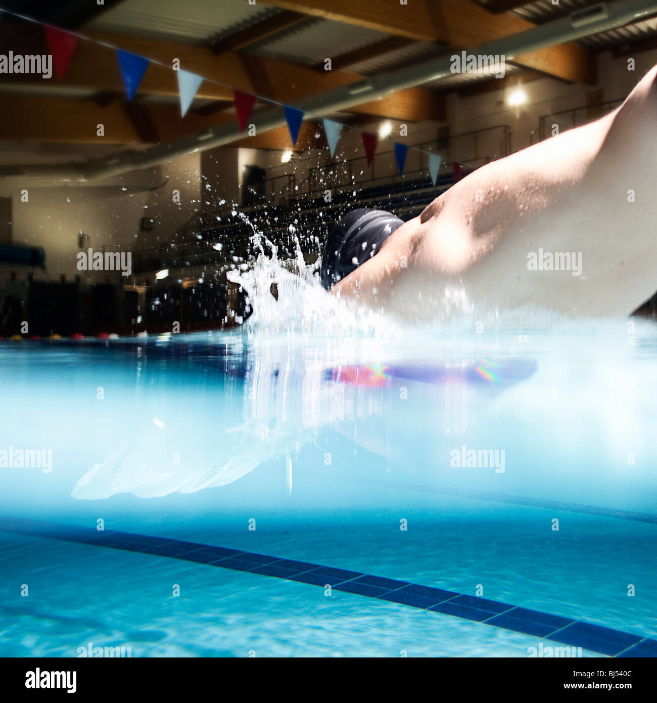 Man diving into a Pool Stock Photo - Alamy