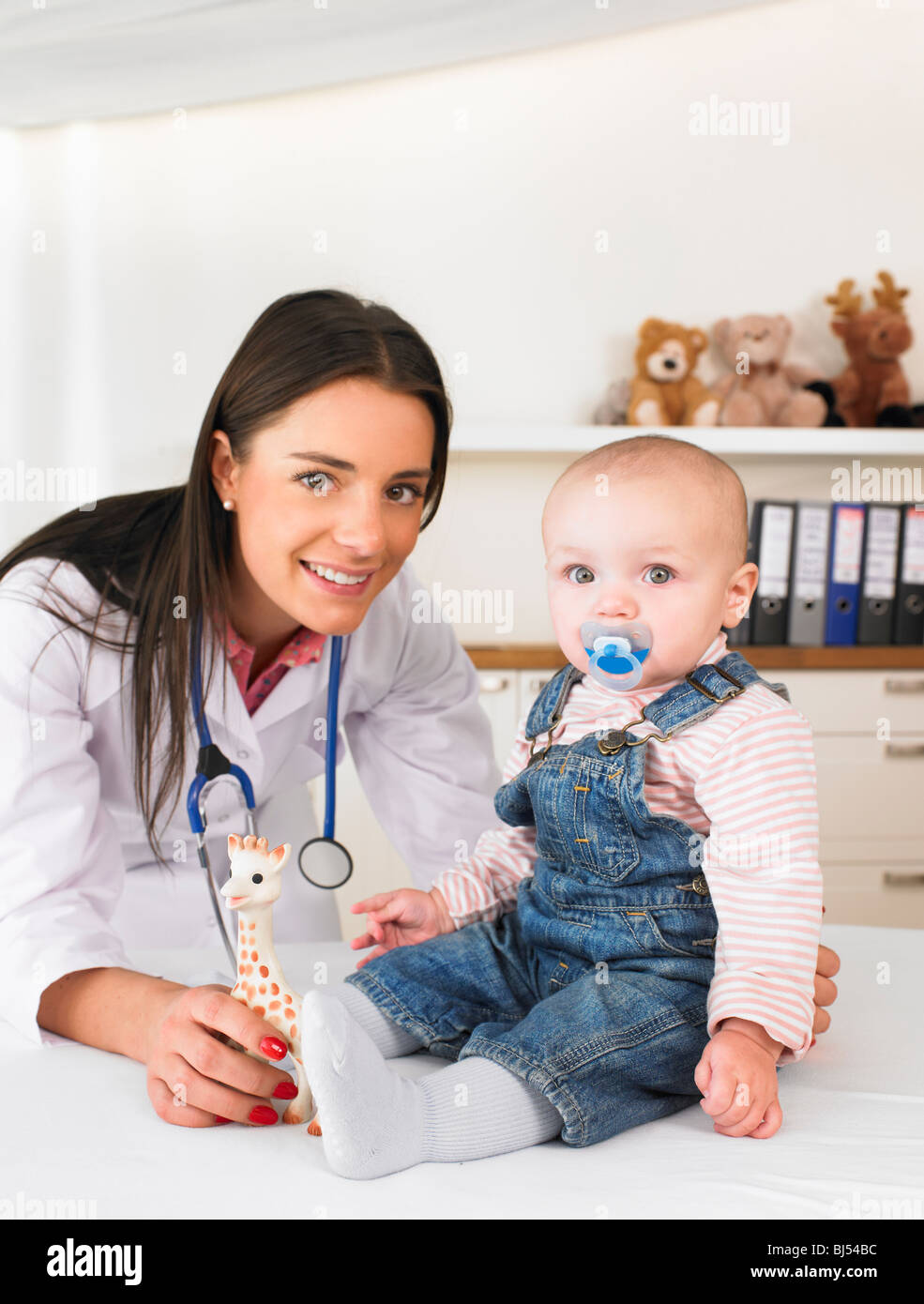Doctor and baby Stock Photo - Alamy