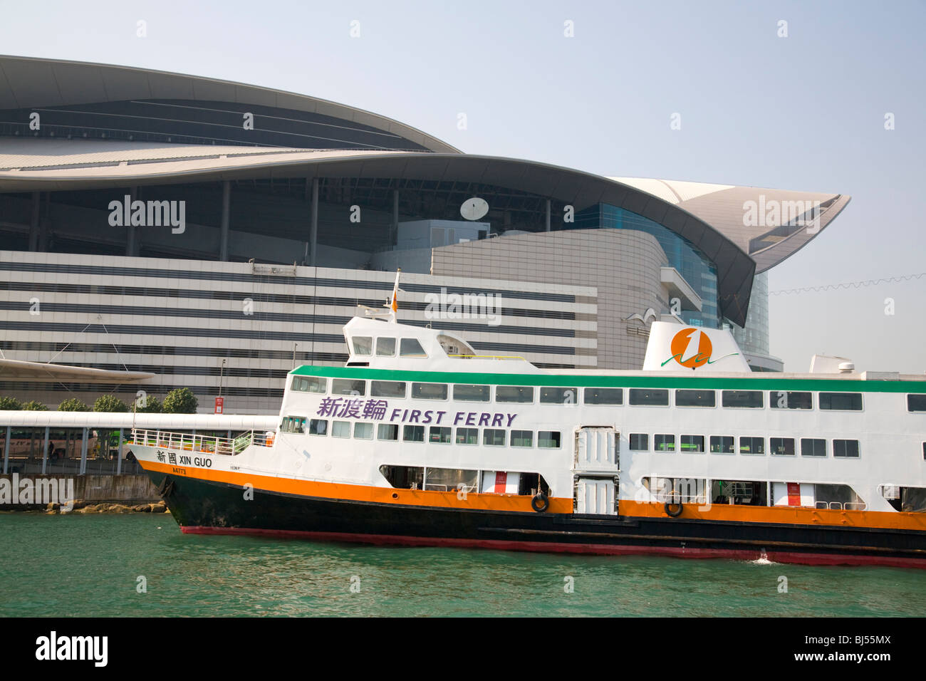 first ferry comes into port in hong kong harbour Stock Photo - Alamy