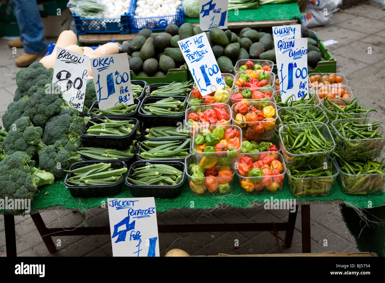 Street market with fruit and vegetables including exotic tropical ...