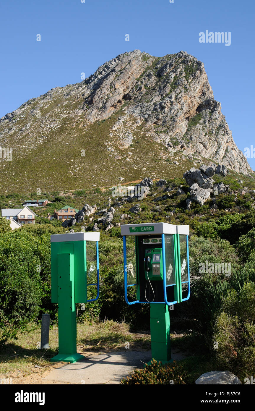 Public telephone boxes in the tiny seaside village of Rooiels in the ...
